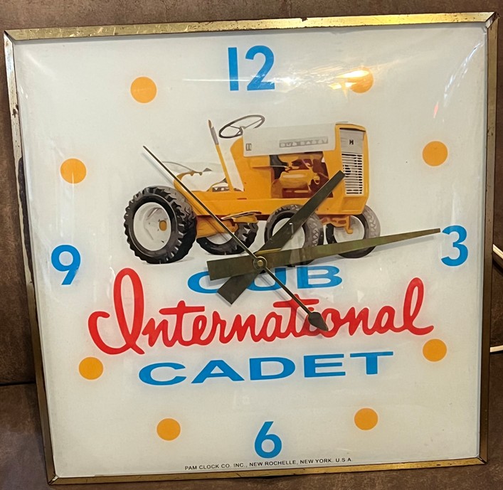 IH clock with Cub Cadet – Geneseo Farm Toy Show